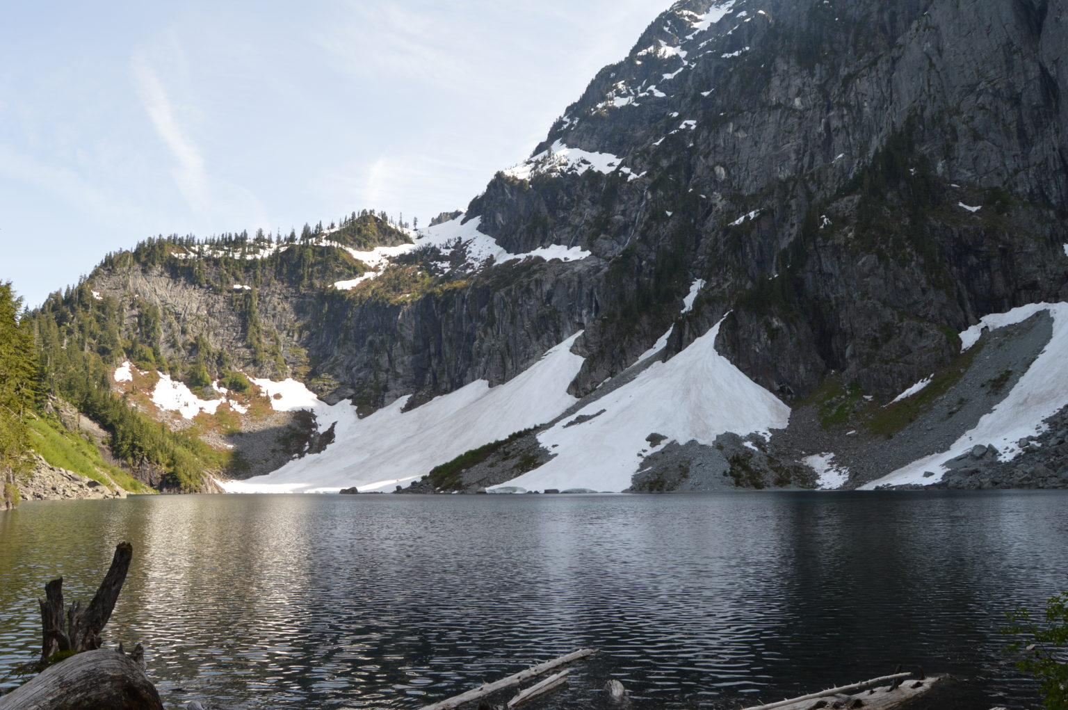 Lake Serene — Placid lake tucked beneath the terrifying towers of Mount ...