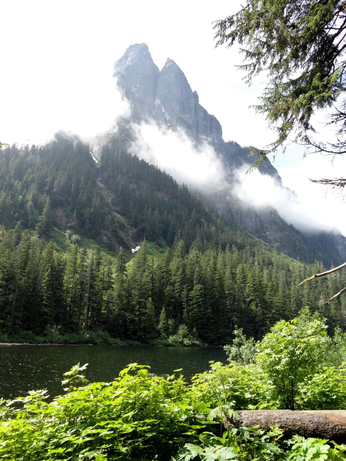 Barclay Lake–placid lake at the base of awe-inspiring Baring Mountain ...